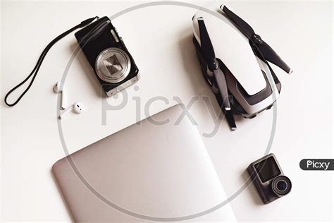 image of flat lay daily vlogging lightweight gadget travel set up