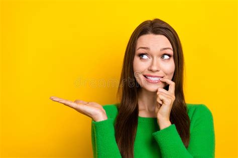 Photo Of Pretty Tricky Lady Dressed Green Pullover Holding Arm Emtpy