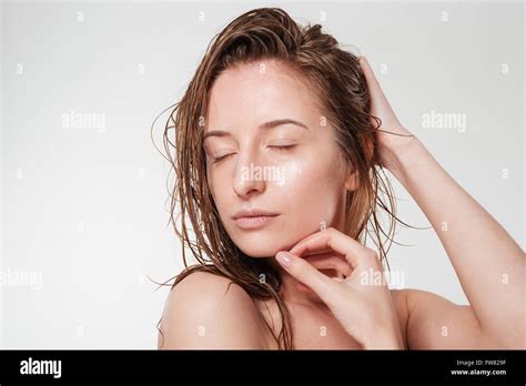 Beauty Portrait Of Relaxed Woman With Closed Eyes Isolated On A White