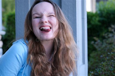 Slow Motion Close Up Portrait Of An Adult Woman Smiling Presenting With