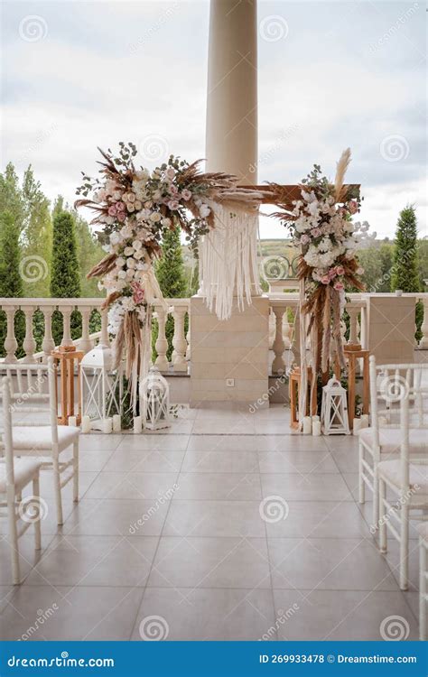 Beautiful Unusual Boho Chic Wedding Arch For Outside Ceremony Stock