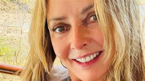 Busty Carol Vorderman Thrills Fans As She Shows Off Her Incredible
