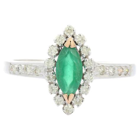Customizable Marquise Shaped Emerald And Diamond Ring In 18k White Gold