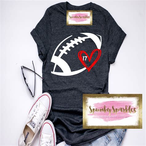 A T Shirt That Says I Love Football With A Heart On It