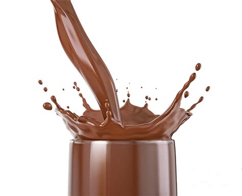 Pouring Liquid Chocolate Into A Glass Photograph By Leonello Calvetti