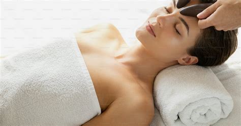 Young And Beautiful Woman During Chinese Traditional Massage Gua Sha