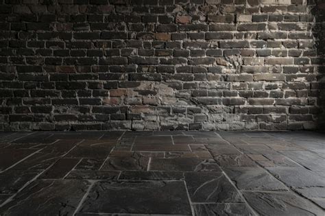 Premium Photo Dark Room With Tile Floor And Brick Wall Background