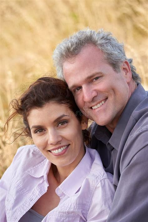 Mature Couple Hug And Portrait At The Sea Ocean Or Walk On Road At