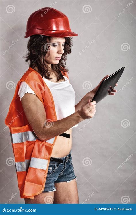 Girl In Safety Helmet Using Tablet Touchpad Stock Image Image Of