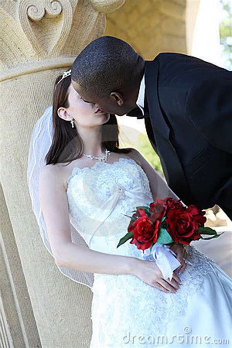 Interracial Wedding Couple Kissing Interracial Wedding Interracial