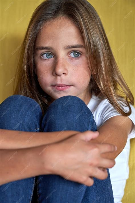 Premium Photo Dreamy Preteen Girl Sitting In Armchair