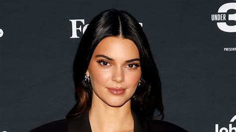 Kendall Jenners Strapless Top Nearly Slips Off Her Thin Frame After