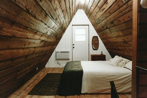 an american cabin shaped like a triangle will make you dream about cozy
