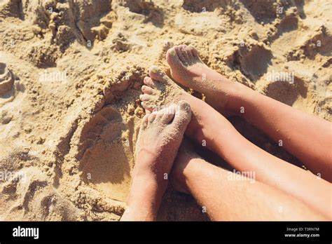 Woman Tanned Legs On Sand Beach Travel Concept Happy Feet In Tropical