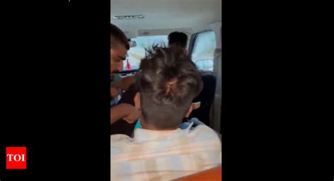 Man Thrashed Forced To Lick Another Persons Feet In Moving Vehicle In