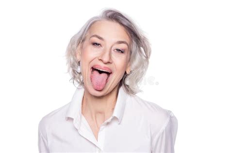 Shot Of A Beautiful Mature Woman Having Fun And Teasing Sticking Out