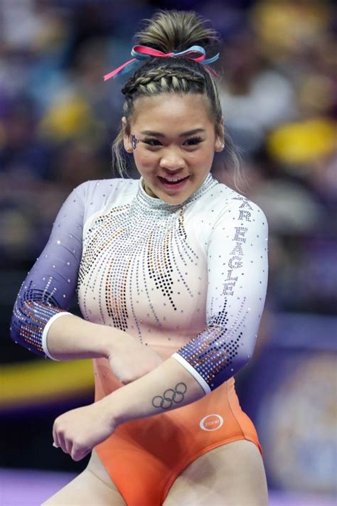 Suni Lee See Photos Of The Gymnast Hollywood Life