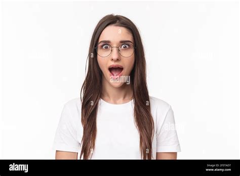 Close Up Portrait Of Enthusiastic Intrigued Young Brunette Woman