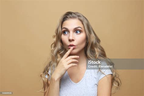 Portrait Of Young Beautiful Cheerful Girl Smiling Looking At Camera