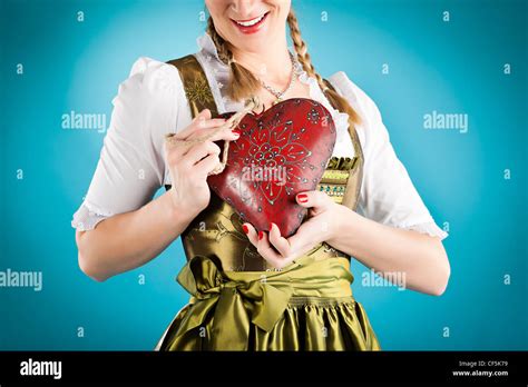 Young Woman In Traditional Bavarian Clothes Dirndl Or Tracht With A