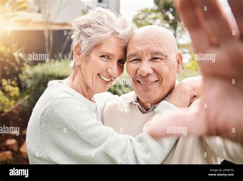 Portrait Selfie Smile And Senior Couple Hug Outdoors In Nature