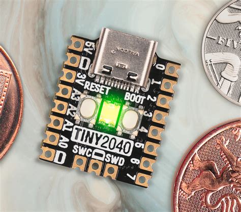 the tiniest raspberry pi rp2040 boards tiny 2040 and adafruit qt py