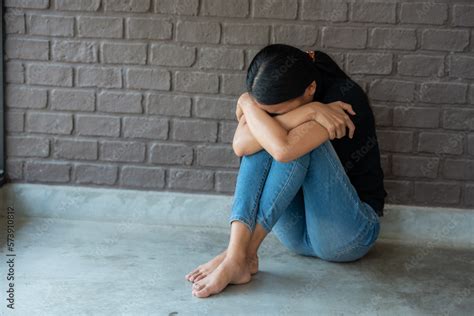 Depressing Woman Is Hugging Knees On The Floor Sad Woman Hug Her Knee