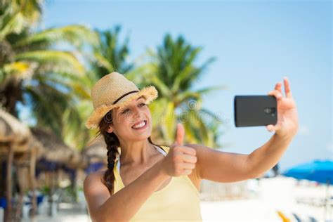 Woman On Tropical Summer Vacation Taking Selfie With Smartphone Stock