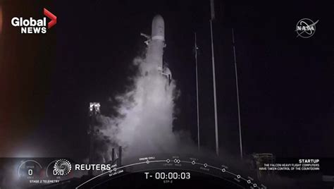 Spacexs Falcon Heavy Rocket Lifts Off With 24 Satellites In First