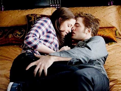 new twilight eclipse scene shows edward and bella in bed together
