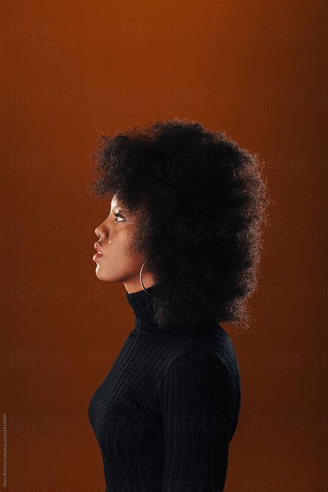 Young Afro Hairstyle Woman By Stocksy Contributor Marc Bordons