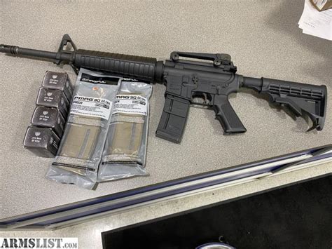 armslist for sale armalite ar 15 mid length heavy barrel rail top