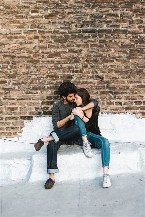 Couple Having Fun On A Rooftop In The City By Stocksy Contributor