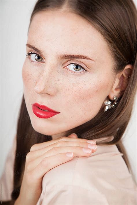 Young Beautiful Woman With Green Eyes Freckles And Red Lips Looking