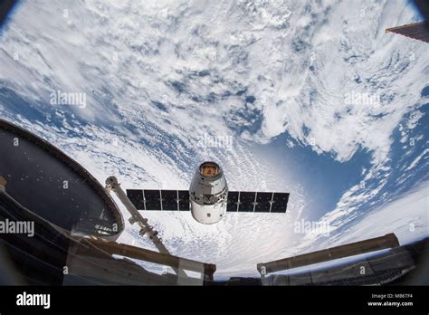 The Spacex Dragon Resupply Spacecraft Approaches To Dock To The