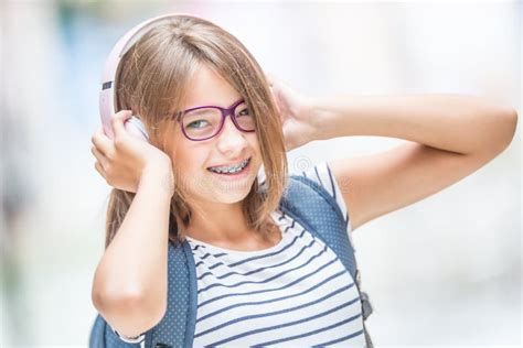 Happy Smiling Girl With Dental Braces And Glasses Young Cute Caucasian