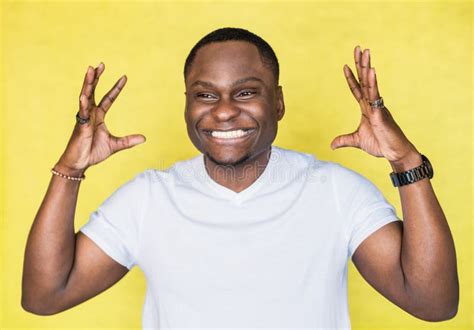 Handsome African American Man Showing Something Big Gesture By Hands