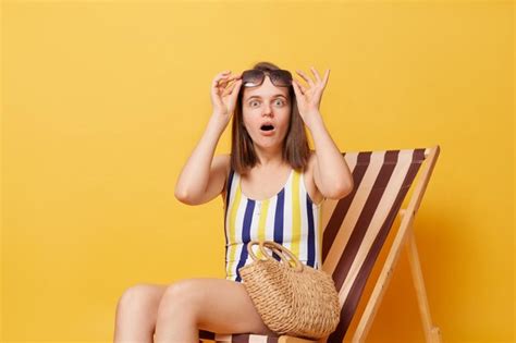 Premium Photo Amazed Excited Woman Wearing Striped Onepiece Swimsuit