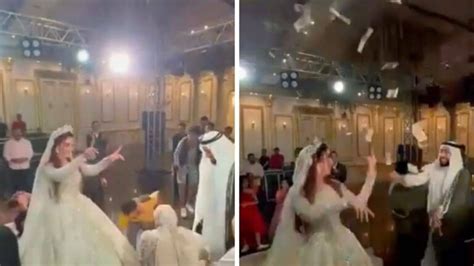 تفاصيل مثيرة حول فيديو العريس الخليجي لماذا رشّ النقود على عروسه