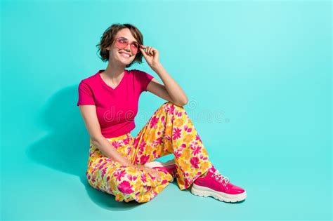Full Length Photo Of Cute Dreamy Woman Dressed Flower Print Trousers
