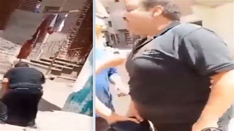 رجل يسحل شقيقته في الشارع أمام المارة فيديو