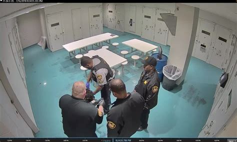 Video Shows Jailers Hit Pepper Spray Restrained Woman