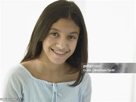 Portrait Of A Teenage Girl Smiling With Braces Foto De Stock Getty Images