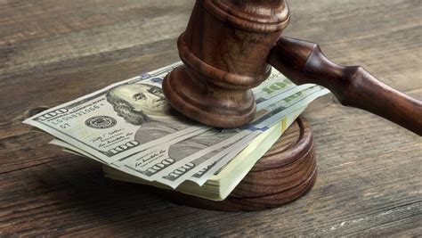 Federal Prison Guard In Georgia Gets 18 Months For Taking Bribes From