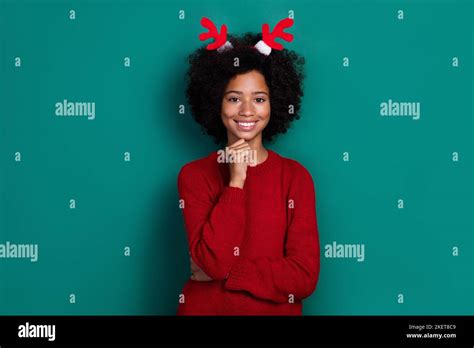 Photo Of Sweet Girl Toothy Smile Hand Touch Chin Wear Reindeer X Mas