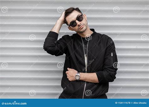 Handsome Young Hipster Man In A Fashionable Black Jacket In Stylish