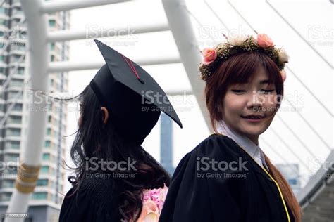Beautiful Graduate Graduates Two Asia Woman Smile And Are Happy After