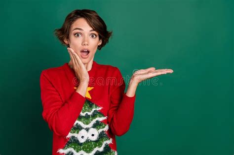 Photo Of Impressed Brown Hair Millennial Lady Hold Empty Space Wear Red