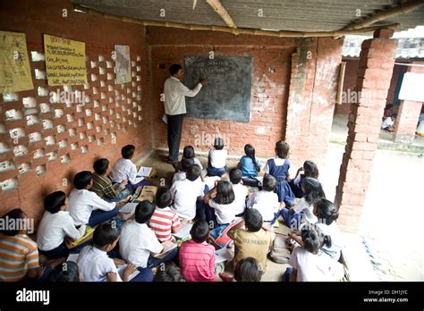 Indian Rural Teacher Teaching In Classroom Village Uttar Pradesh India