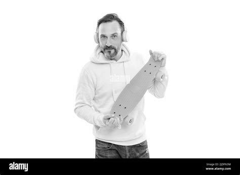 Happy Man Listen Music In Headphones Hold Penny Skateboard Isolated On